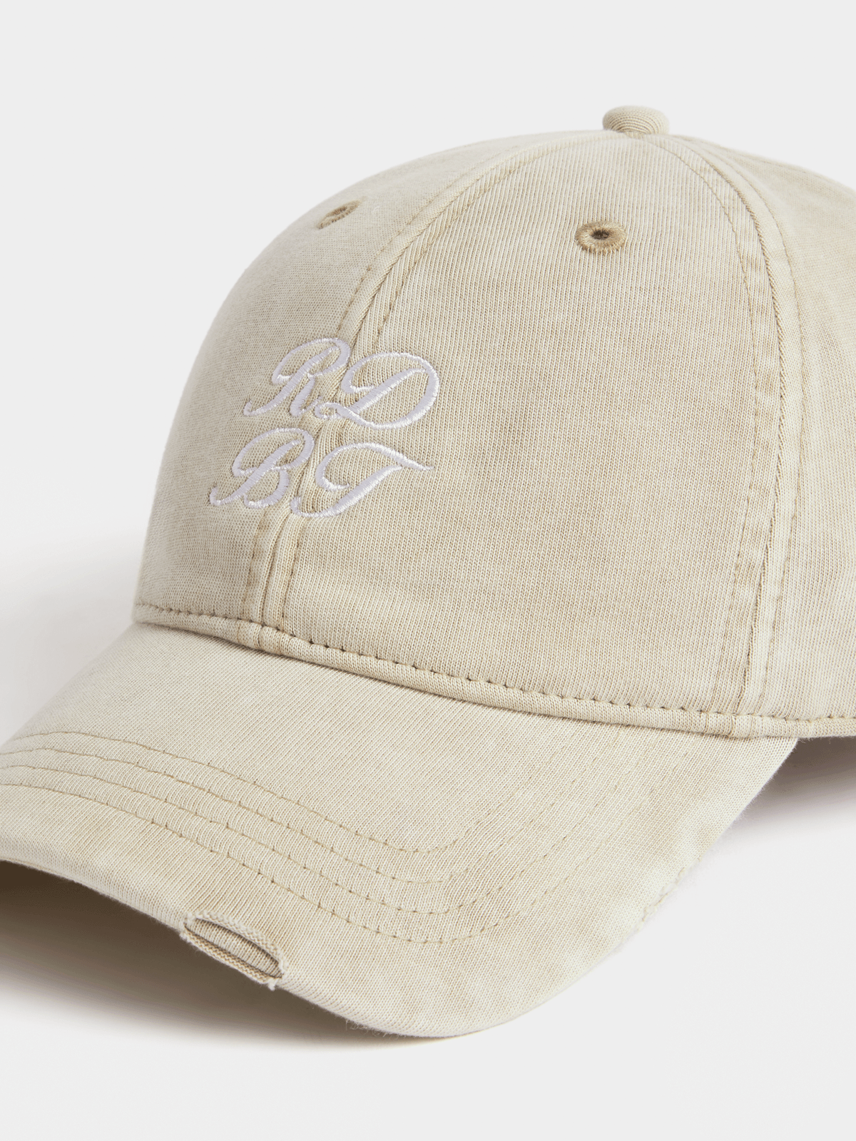 Rebat Unisex Laundered Knit Ripped Stone Cap | Bash