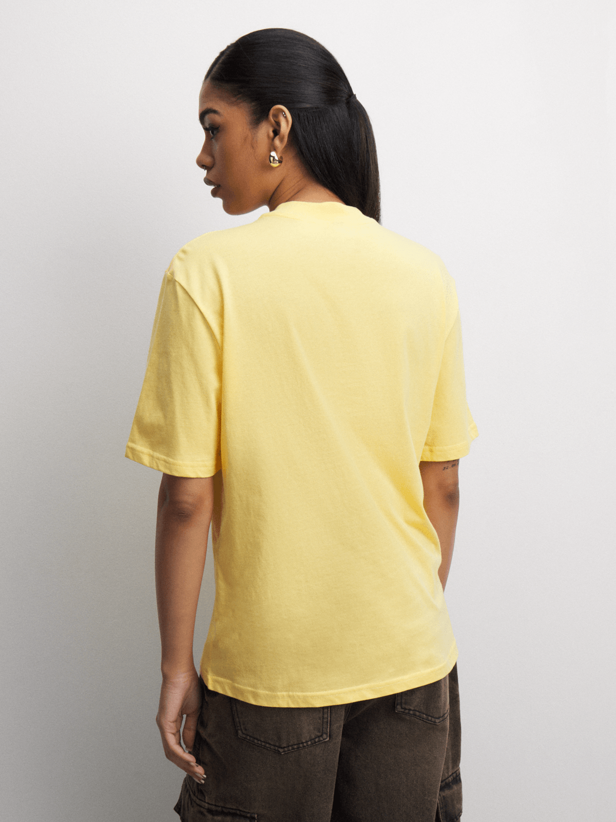 The FIX Women's Yellow 'Go Find Less' Graphic Top | Bash